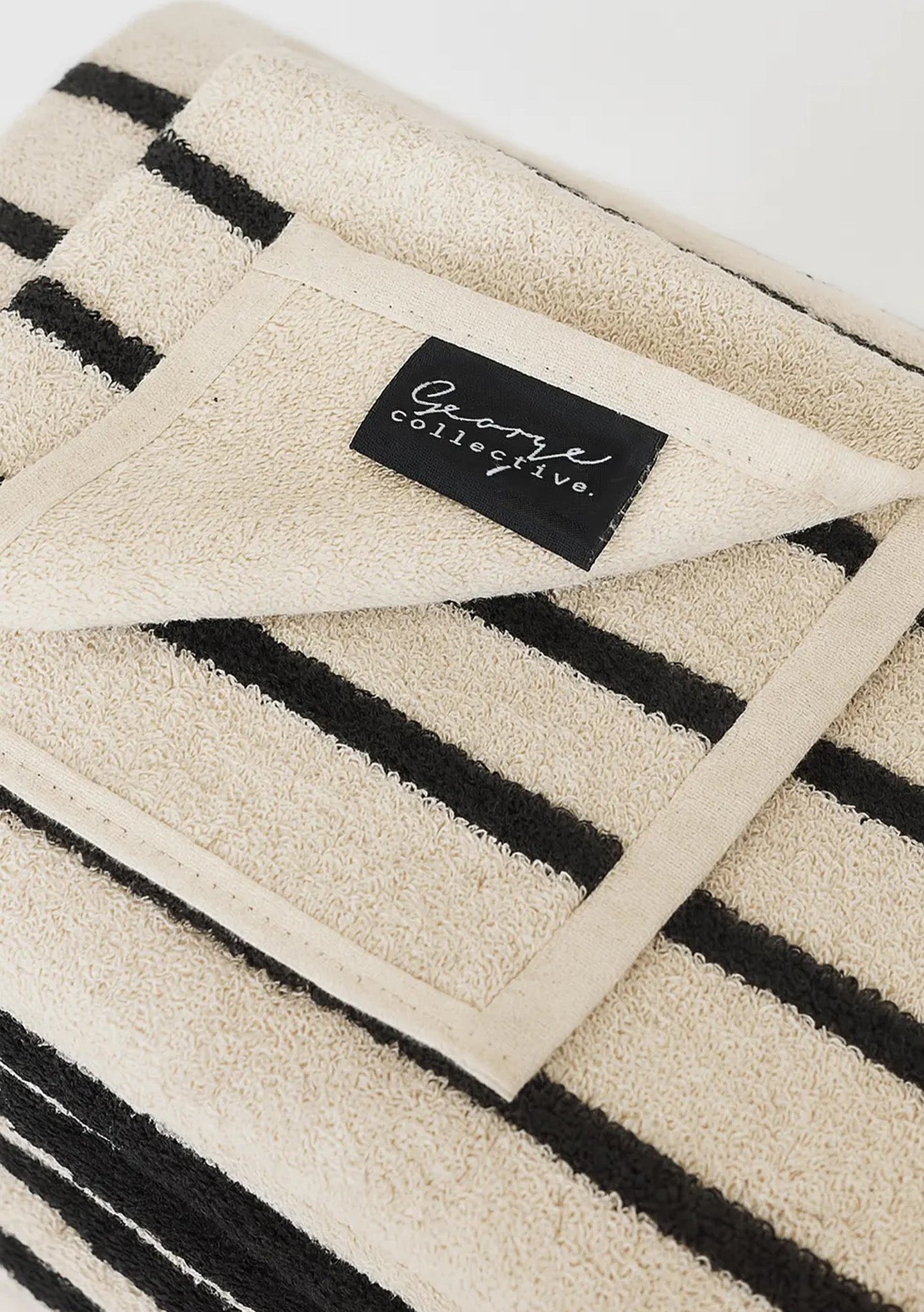 George Collective - Adults Poncho - Black Stripe - Onceit